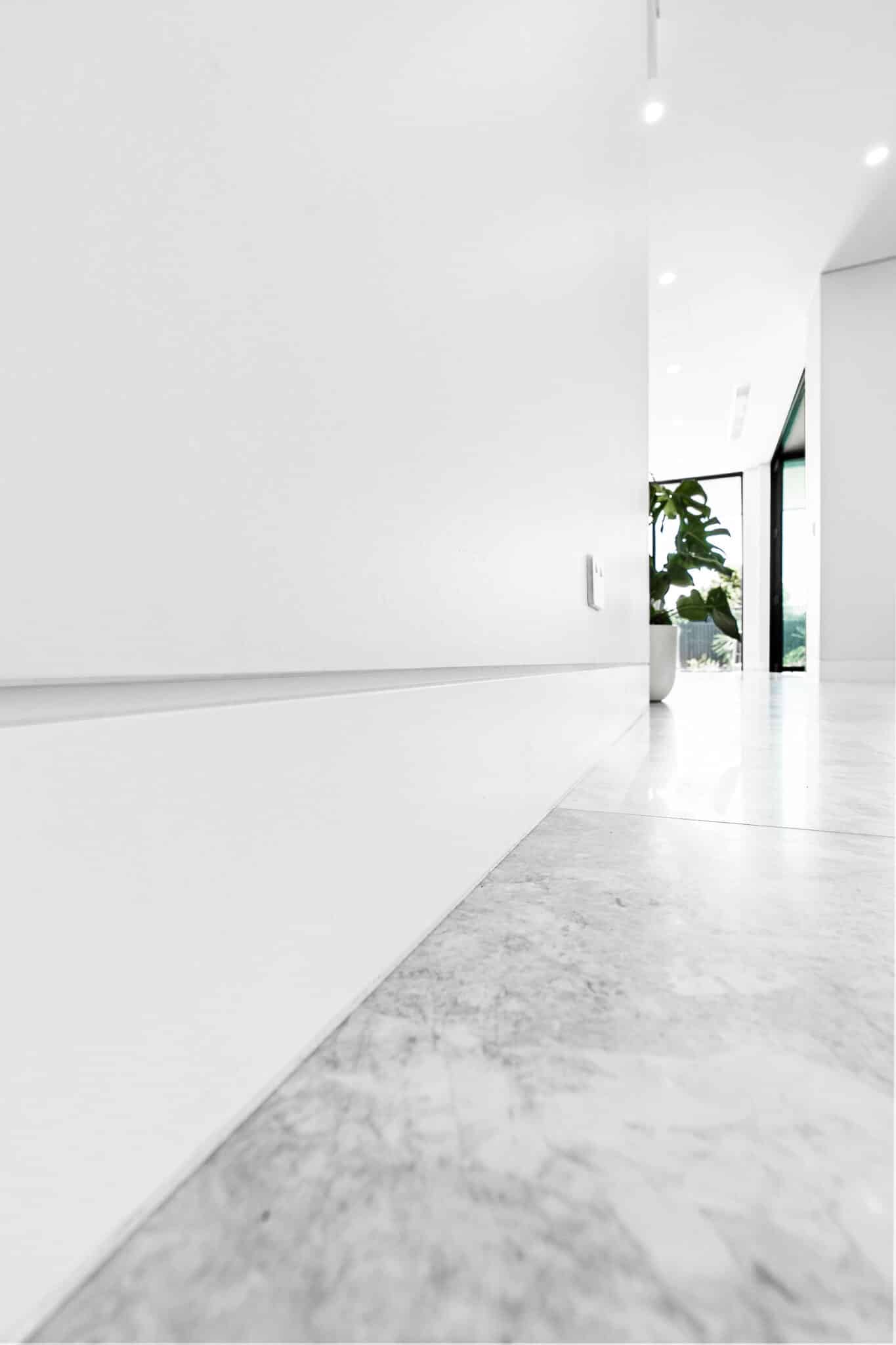 Modern Minimalist Home Featuring Intrim Shadowline® Skirting